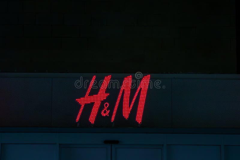 Illuminated H&M Logo Above Storefront Editorial Photo - Image of style ...