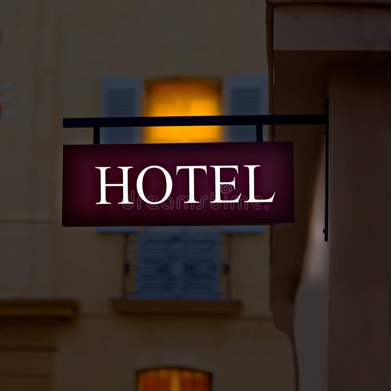 Illuminated Hotel Purple Sign Stock Image - Image of travel, luxury ...