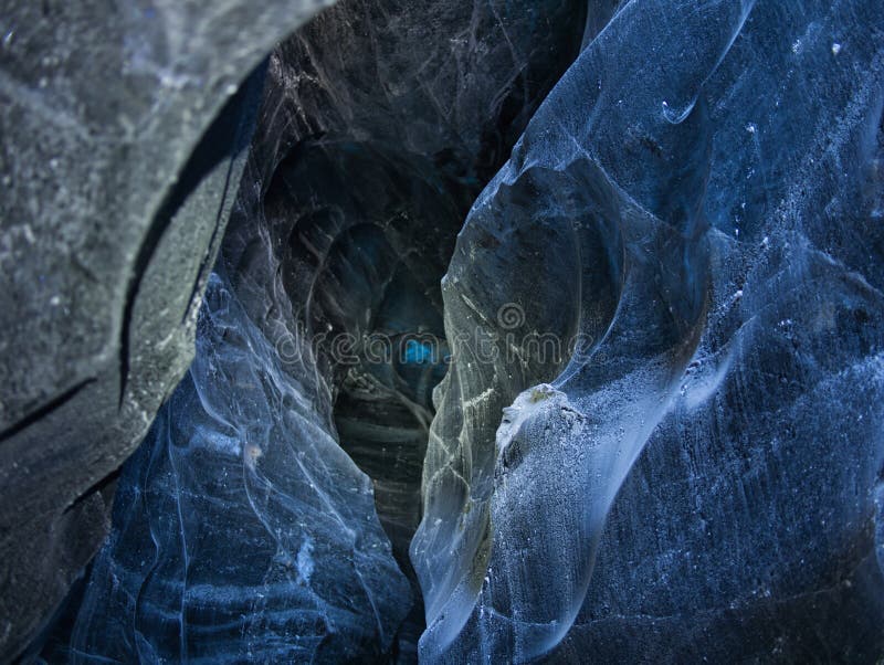 Illuminated Ice in a Blue Glacier Cave Stock Image - Image of cave ...