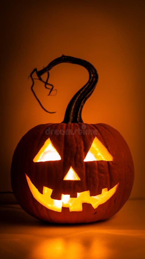 Illuminated Jack O Lantern with Triangular Eyes, Jagged Mouth, Curved ...