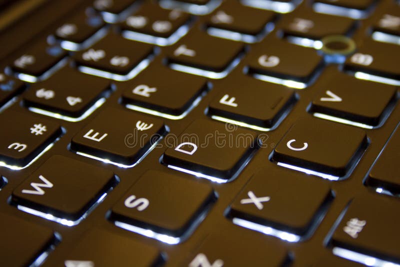 Illuminated Laptop Keyboard with Black Keys Stock Photo - Image of ...