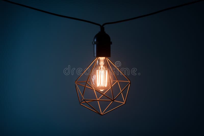 Geometric Polyhedron Light Bulb Glowing Against Dark Background ...