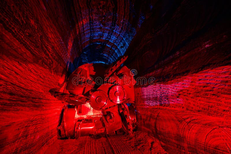 Illuminated Mining Drilling Machine in Salt Quarry Tunnel Stock Photo ...