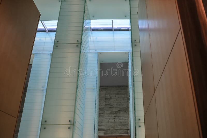 A Modern Architectural Hallway with Illuminated Transparent March 28 ...