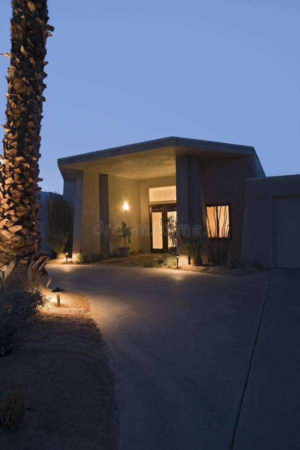 Illuminated Modern Home at Night Stock Image - Image of facade, home ...