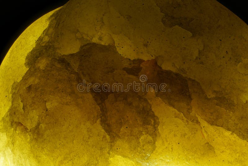 Illuminated Moon-shaped Stone Stock Photo - Image of light, black ...