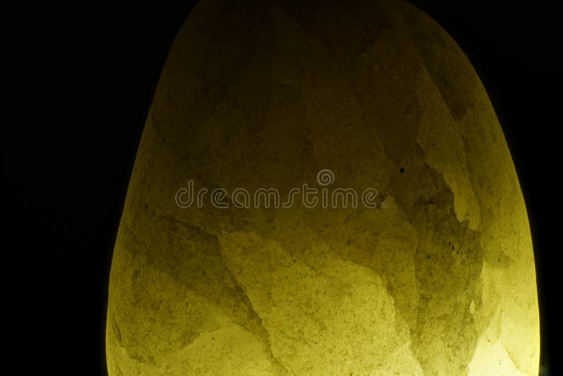 Illuminated Moon-shaped Stone Stock Photo - Image of dark, earth: 247365202