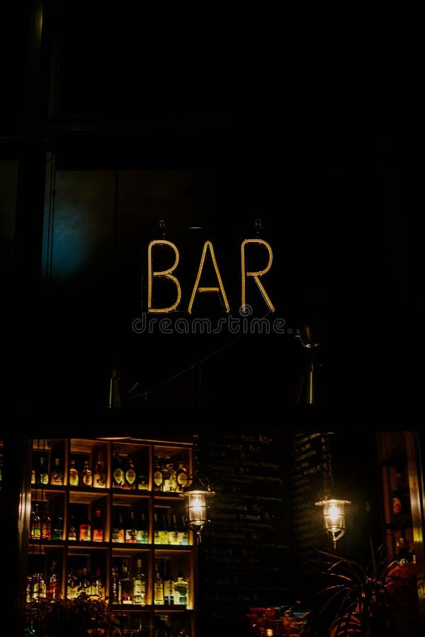 Illuminated Neon Sign of the Word "BAR" Stock Image - Image of glowing ...