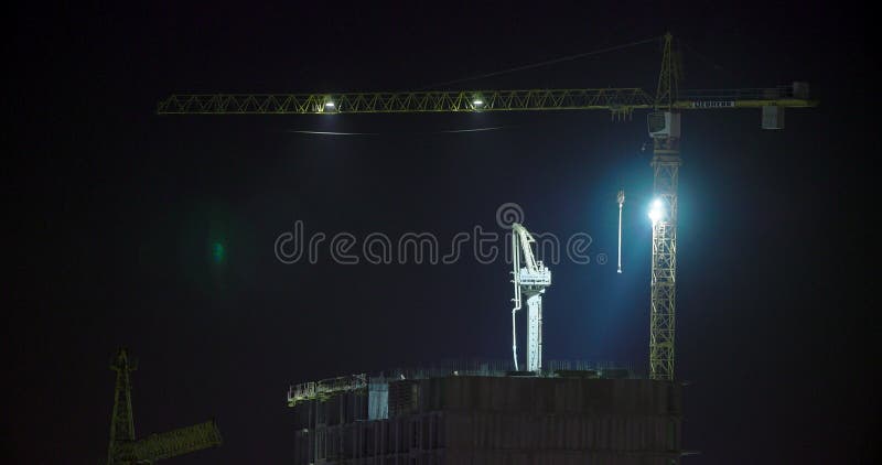 Illuminated Night Time Work. Crane Work. Timelapse Nightwork ...