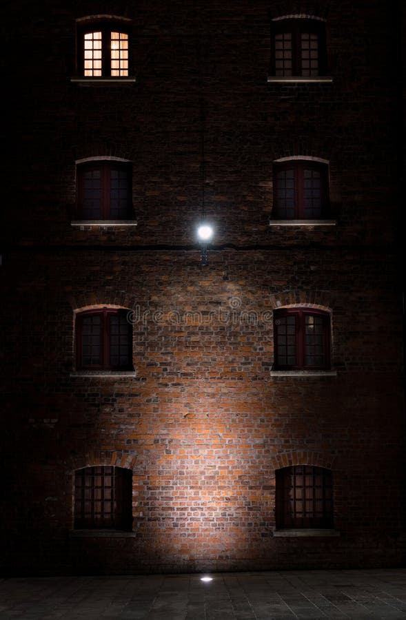 Illuminated Old Brick Building at Night Stock Image - Image of ...