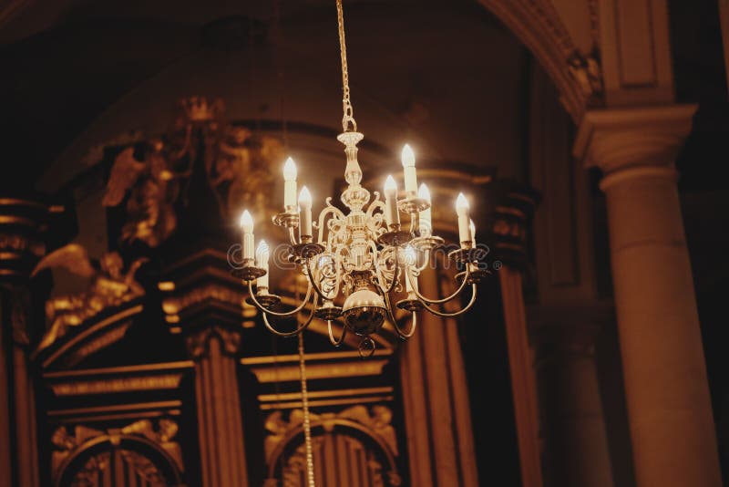 Illuminated Old-style Chandelier Inside Building Stock Image - Image of ...