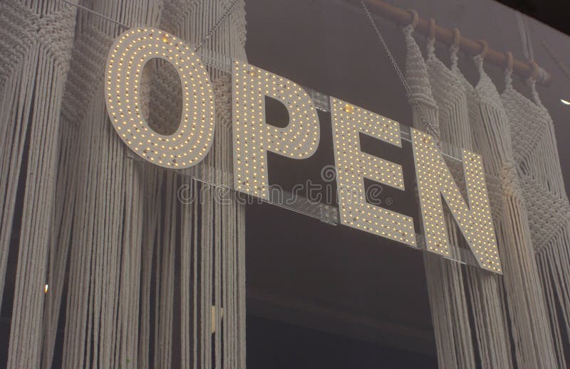 Illuminated Open Sign in Window of Local Boutique Shop Stock Image ...