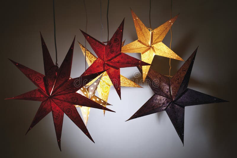 Illuminated paper stars stock image. Image of ornament - 50489621