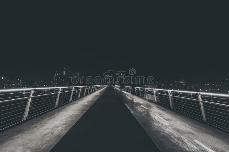 Illuminated Pedestrian Bridge at Night Stock Photo - Image of freedom ...