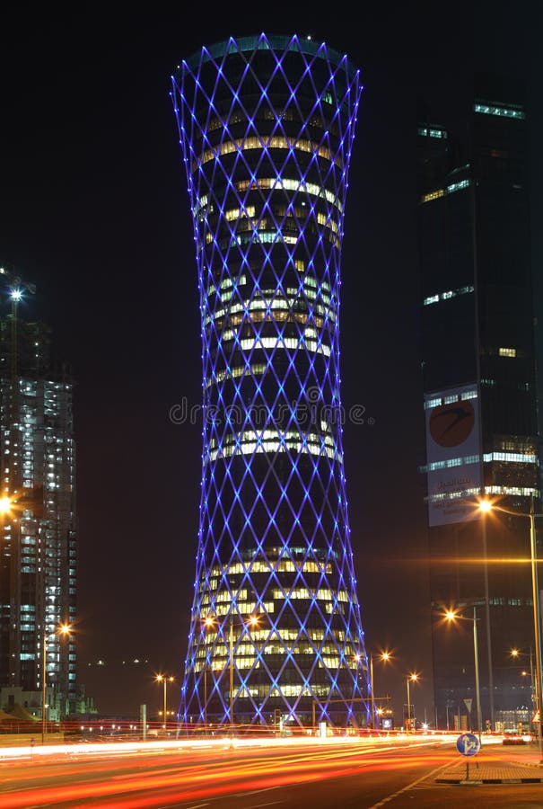 Illuminated QIPCO Tower, Doha Editorial Photography - Image of night ...