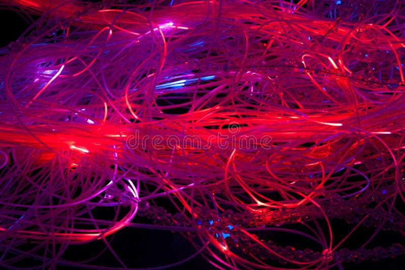 Illuminated Red Fiber Optics Cables Stock Photo - Image of electronics ...