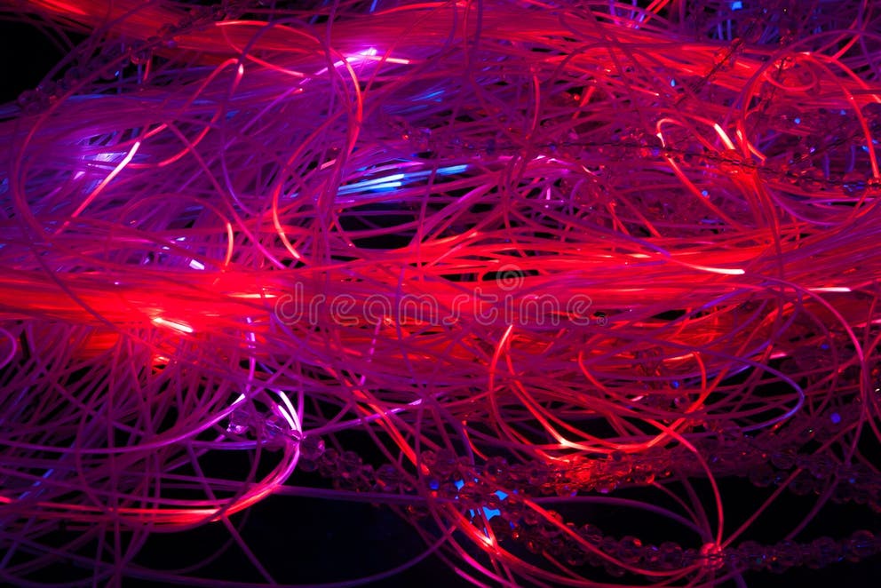 Illuminated Red Fiber Optics Cables Stock Photo - Image of electronics ...
