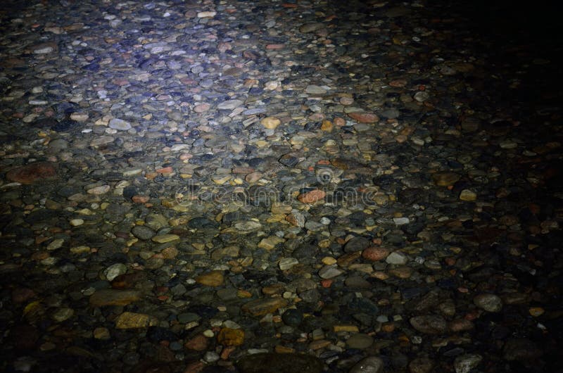 Illuminated River Rock at Night Under Water Stock Photo - Image of rock ...