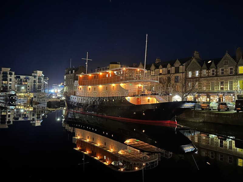 Illuminated Ship-hotel at the Dock during the Nighttime in Hong Kong ...