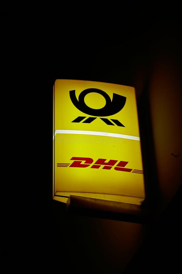 Illuminated Sign of the German Logistics Company DHL Editorial Photo ...