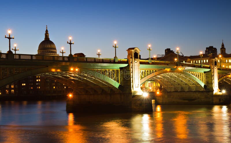 Illuminated Southwark Bridge Stock Photo - Image of basilica, england ...