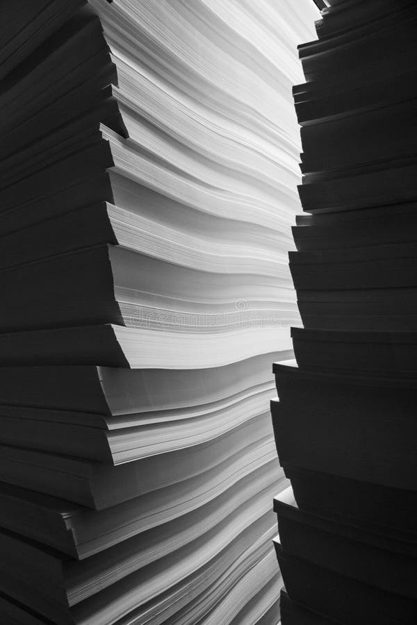 Illuminated Stacks of White Paper Stock Photo - Image of industry ...