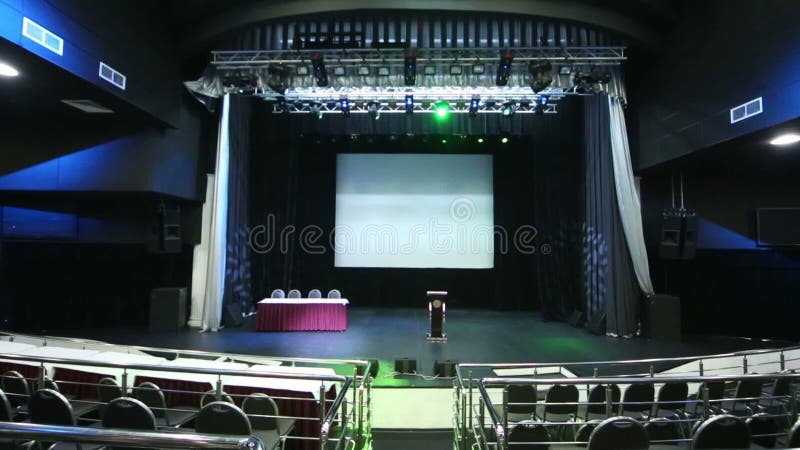 Illuminated Stage and Modern Auditorium with Seats Stock Video - Video ...