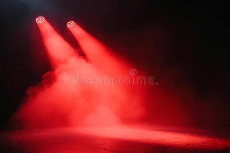 Illuminated Stage with Red Spotlight and Smoke Creating Dramatic ...