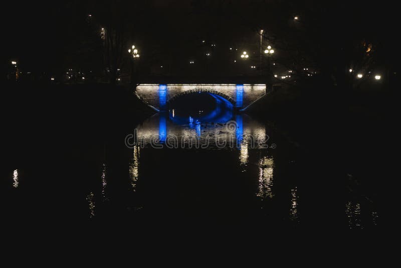 Illuminated Stone Bridge with Blue Lights. Bridge Lighting at Night ...