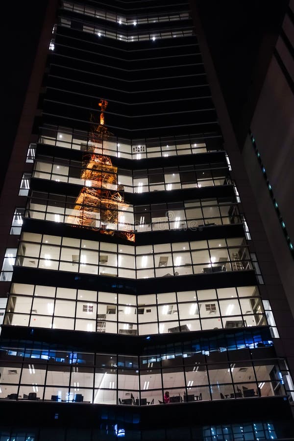 Illuminated Tower Reflecting on the Mirrored Building Facade Stock ...