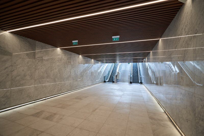 Illuminated Underground Passage with Marble Walls Stock Image - Image ...