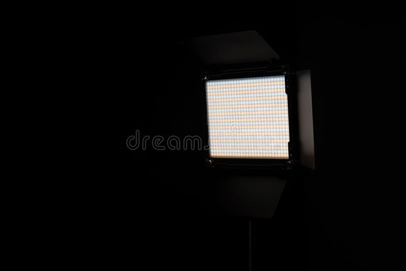 Illuminated Video Light in Front of a Black Background Stock Photo ...