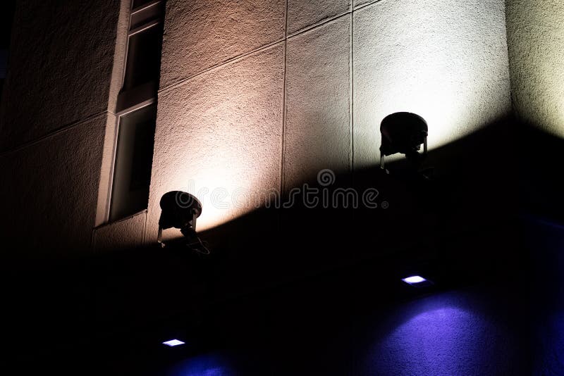 Illumination at Night on Wall of Building Stock Photo - Image of shadow ...