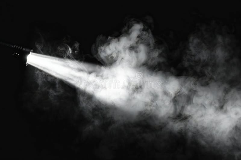 A Flashlight Beam Shining through Smoke on Black Background. the Light ...