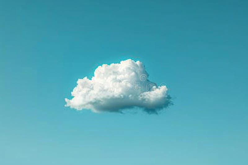 One White Cloud Floating in the Sky Against a Solid Blue Background in ...