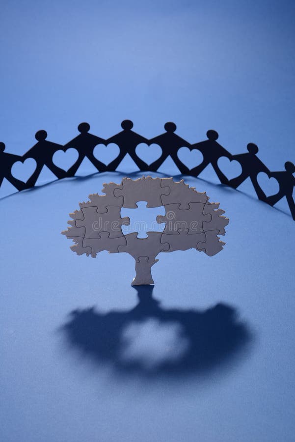 Illustration of People in Chain Around Jigsaw Puzzle Tree Stock Photo ...