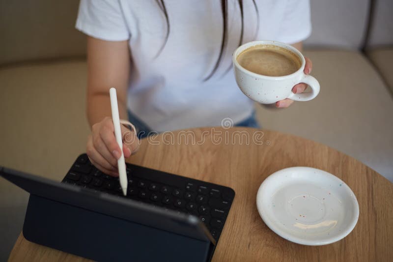 Illustrator Drawing a Sketch with Stylus Pen on a Tablet Computer and ...