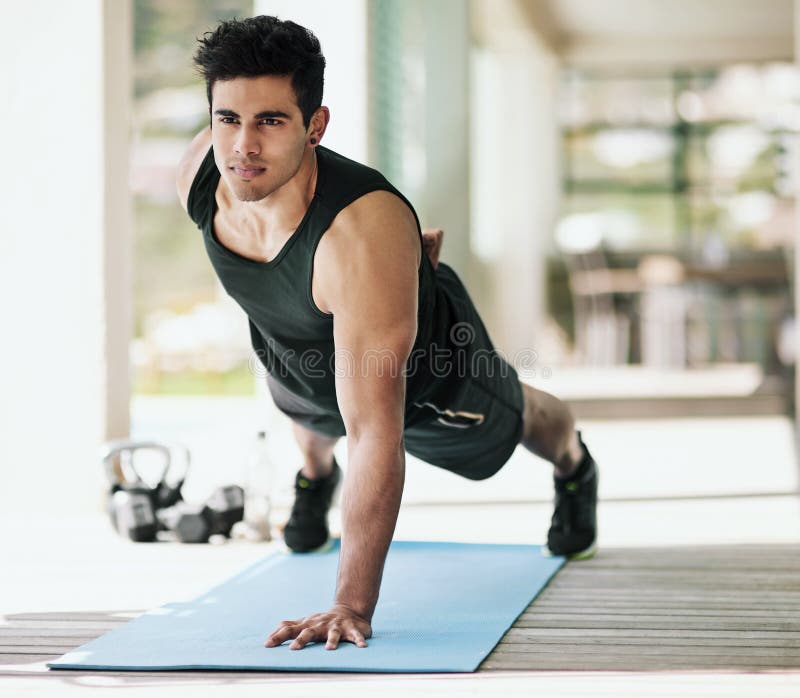Hes a Lean, Mean Training Machine. a Focussed Young Man Working Out ...