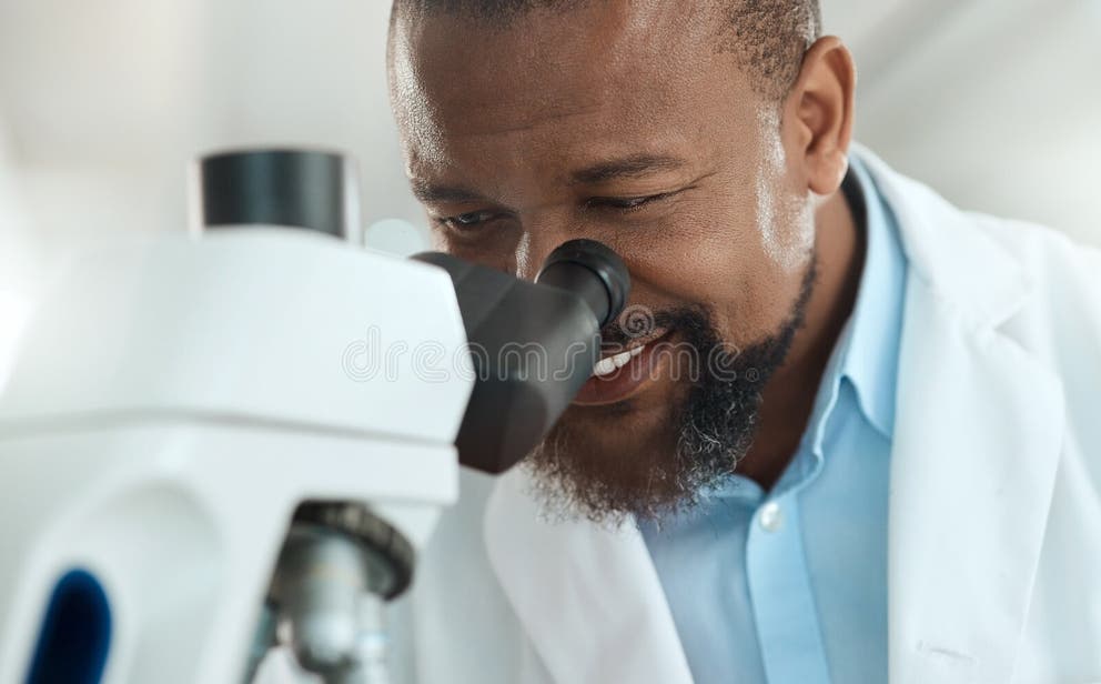 Im Looking Right at the Problem. a Handsome Mature Scientist Using a ...