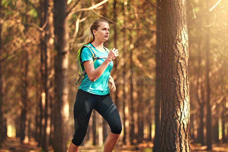 Im Working on Beautifying Myself. a Young Woman Out Running in the ...