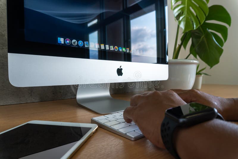 IMac Computer, IPad and Hands Working on Keyboard Editorial Photo ...