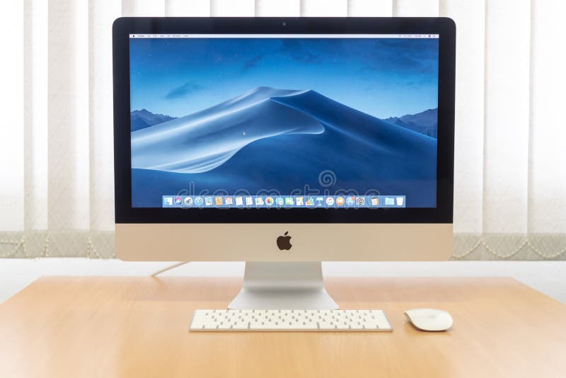 Imac computer on table editorial stock image. Image of high - 130872404
