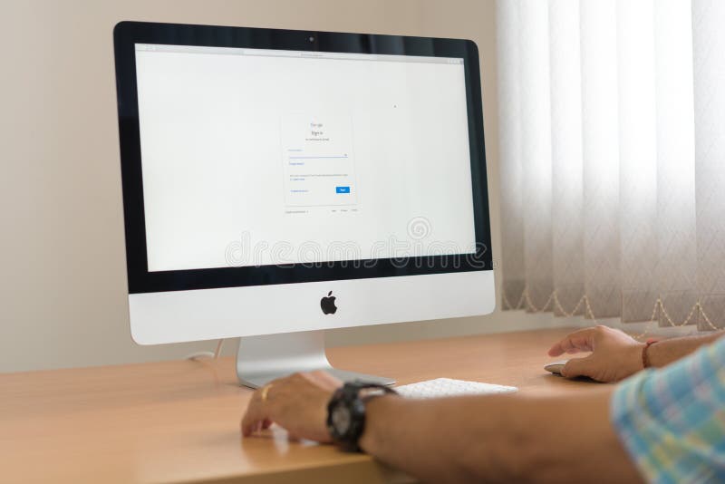 Imac computer on table editorial stock image. Image of high - 130872404