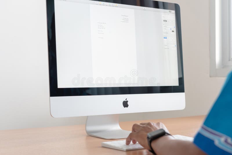 Imac computer on table editorial stock image. Image of high - 130872404