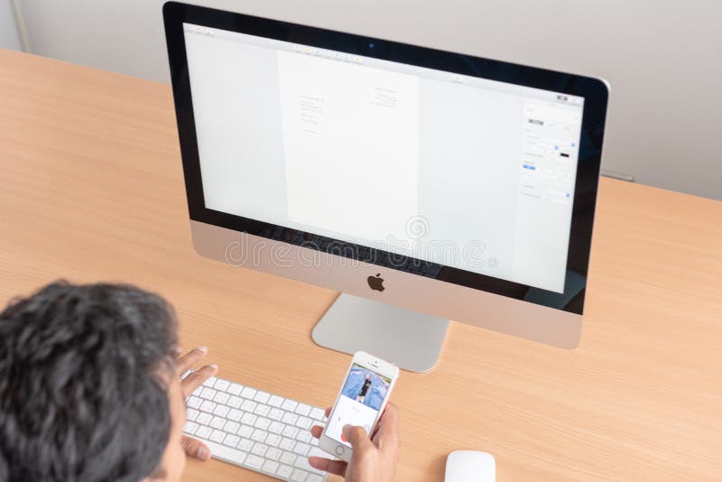Imac computer on table editorial stock image. Image of high - 130872404
