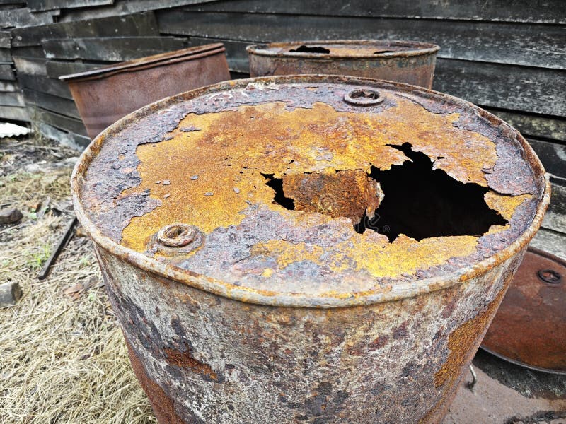 Abandoned Empty and Rusty Metal Barrel Left at the Junkyard. Stock ...