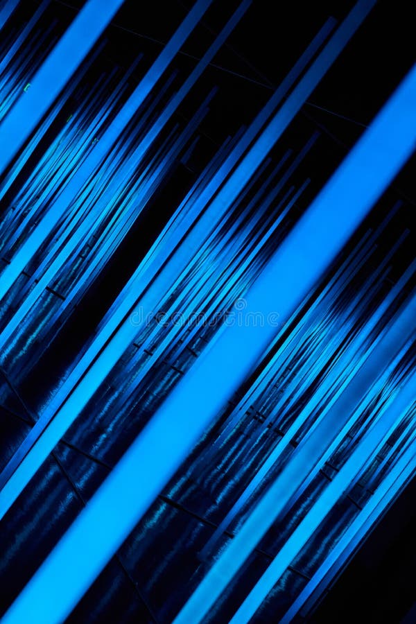 Abstract Neon Light Poles Angled in Blue Editorial Photo - Image of ...