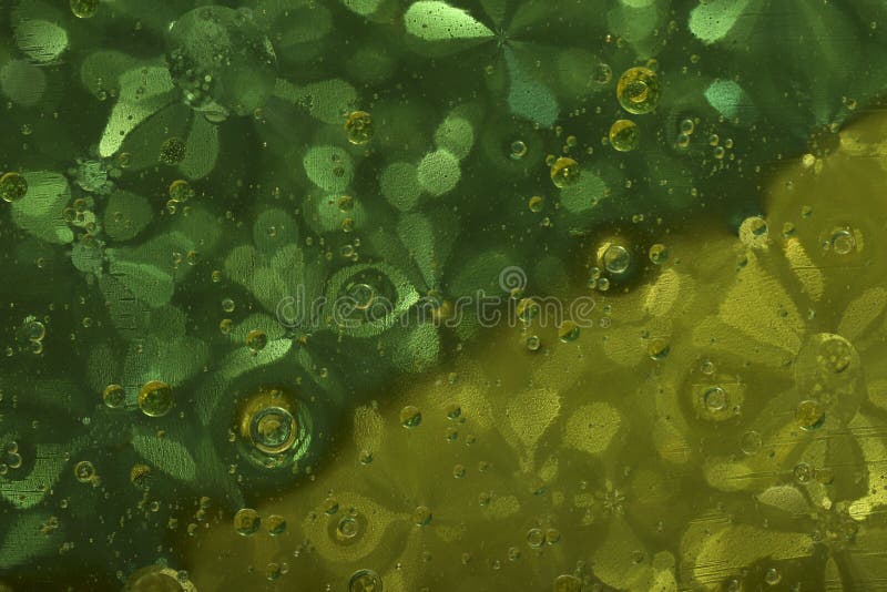 Image of Abstract Reflections of a Green and Yellow Surface Connecting ...