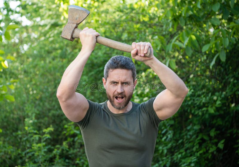Image of Aggressive Man with Axe. Aggressive Man with Axe. Aggressive ...