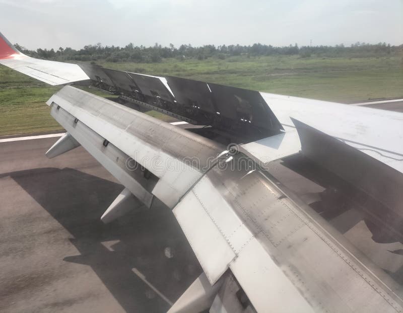 Image of Airplane Wing Position Few Seconds after Airplane Landing ...